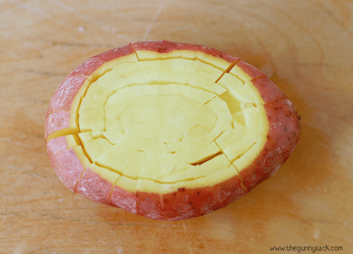 Cut your potatoes this way. The end result is a delicious bloomin ...
