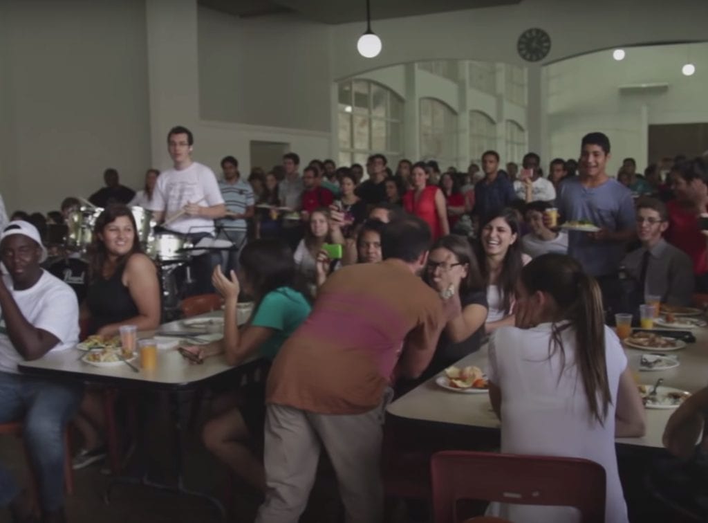 Amazing singing flash mob takes over university cafeteria