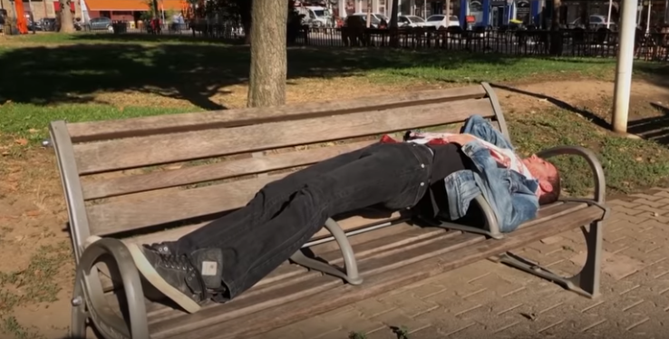Artist makes anti-homeless spikes a comfortable place to rest