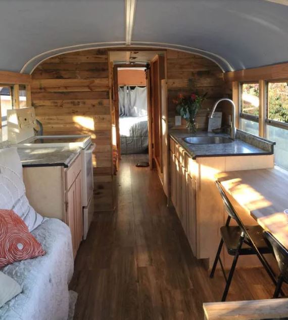 Woman converts big yellow buses into homes for homeless