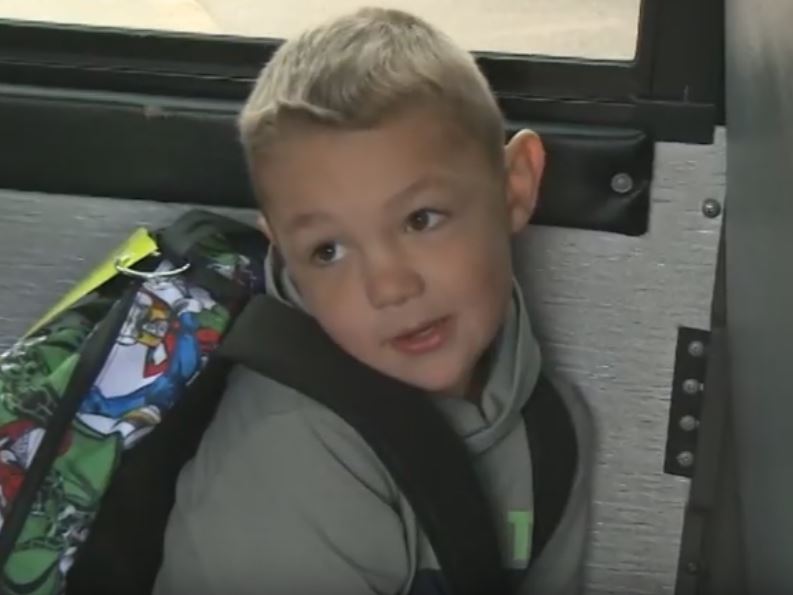 Photo of bus driver grasping preschooler makes headlines