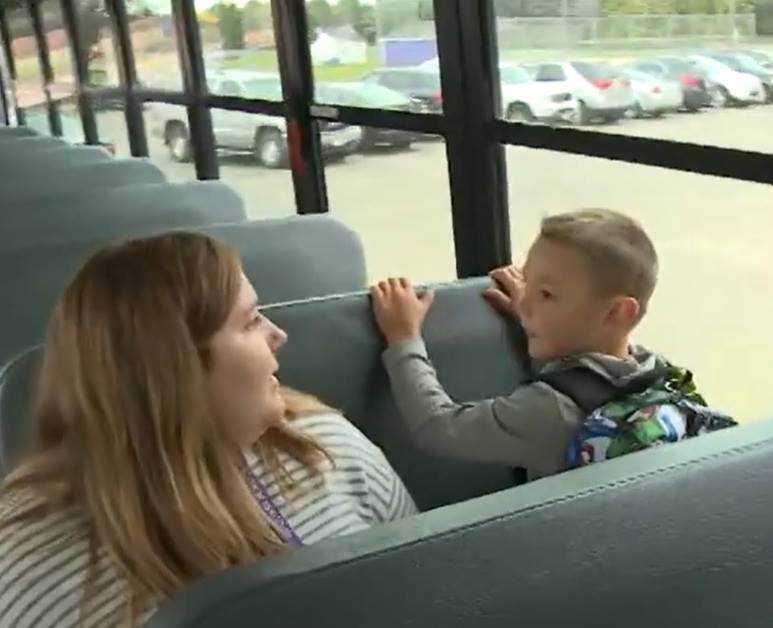 Photo of bus driver grasping preschooler makes headlines