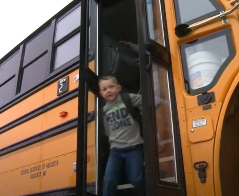 Photo of bus driver grasping preschooler makes headlines
