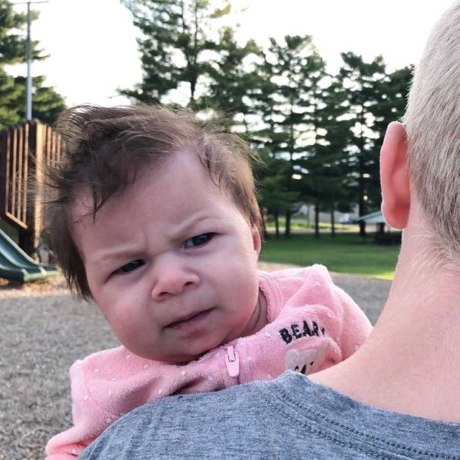 Baby girl born with a fixed "angry" expression is healthy after ...