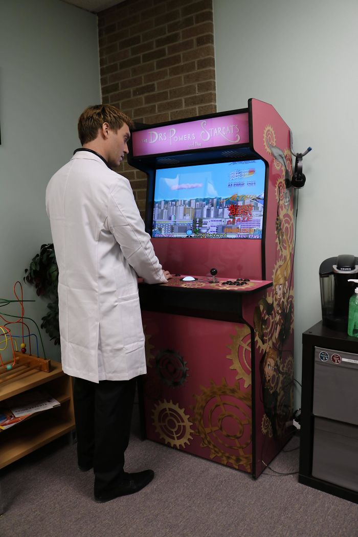 Doctor opens a family clinic with therapy cats and video games for ...