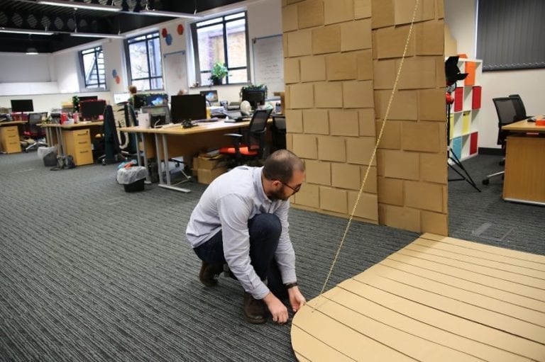 Employees decorate their desks with over the top creation