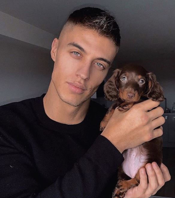 50 hot guys share pics with their dogs & they’re sure to make anyone drool