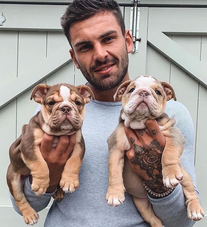 50 hot guys share pics with their dogs & they’re sure to make anyone drool