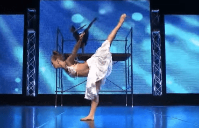 Girl teeters from high platform – then ‘angel’ dancers come to her ...