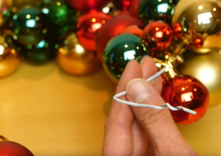 Create A Gorgeous Christmas Wreath With Baubles And A Wire Hanger