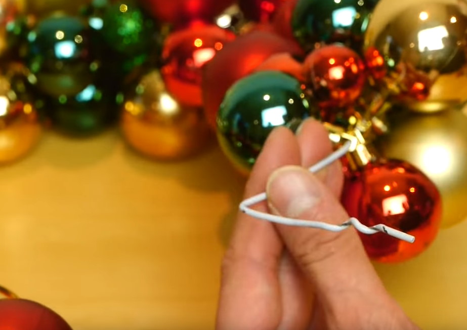 Create A Gorgeous Christmas Wreath With Baubles And A Wire Hanger
