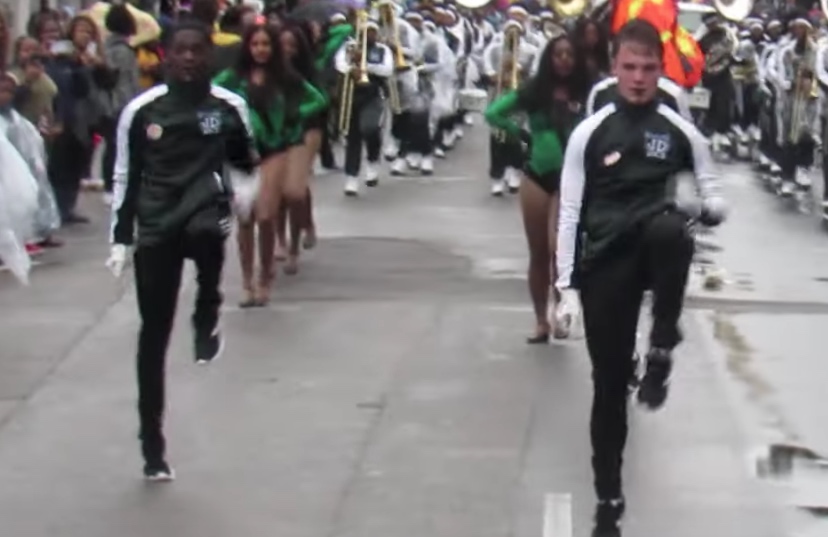 High school band delivers stunning performance during game-day parade