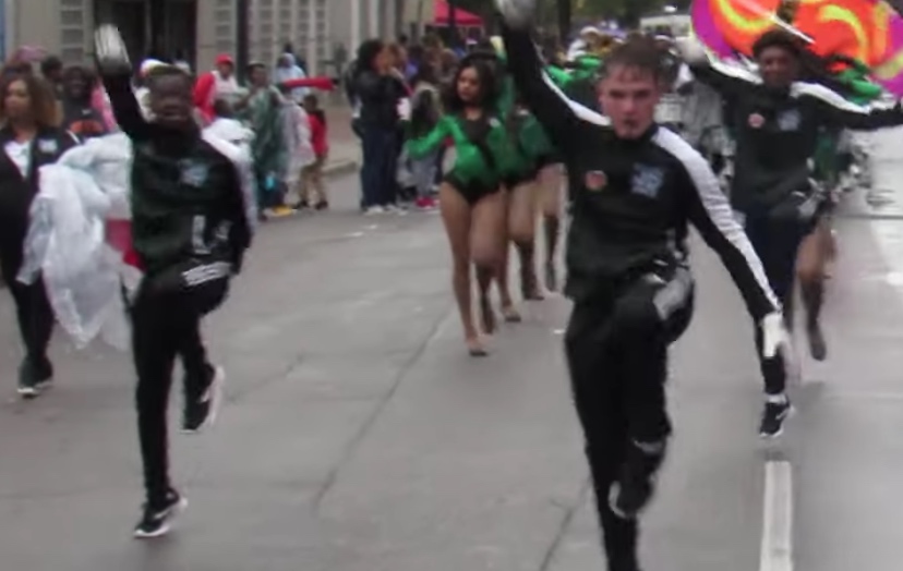 High school band delivers stunning performance during game-day parade