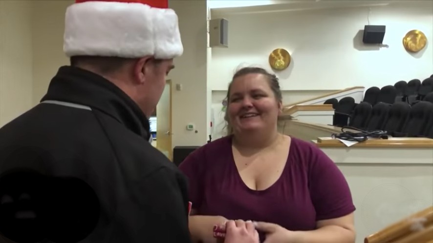 Couple Overwhelmed With Emotion When Secret Santa Shows Up