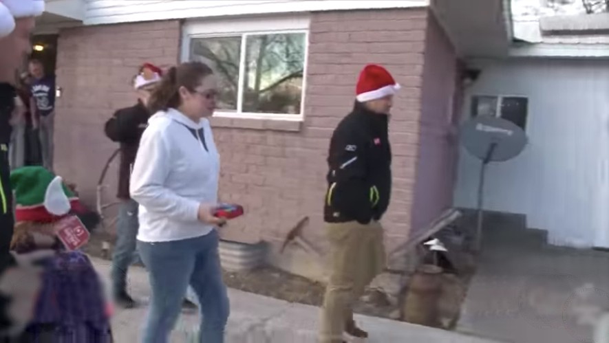 Couple Overwhelmed With Emotion When Secret Santa Shows Up
