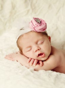 Newborn baby girl ‘mean mugs’ photographer during photoshoot