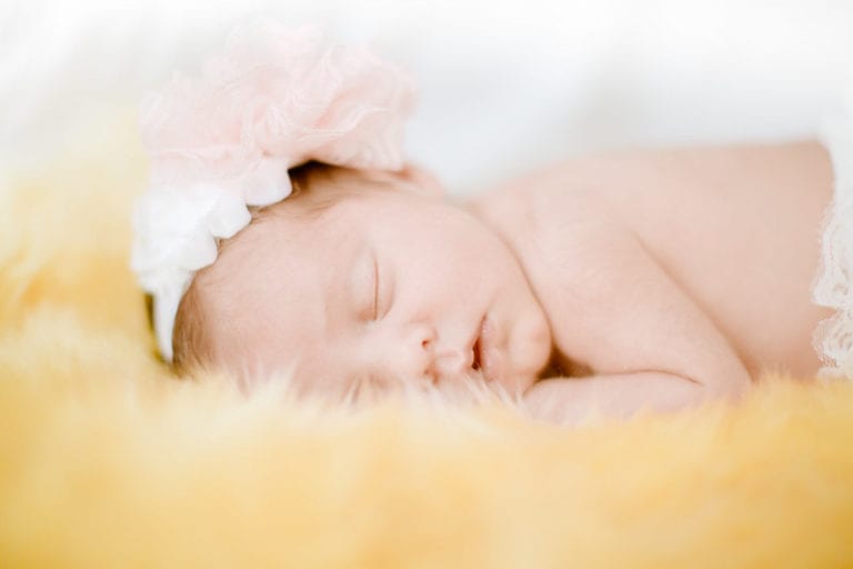 Newborn baby girl ‘mean mugs’ photographer during photoshoot