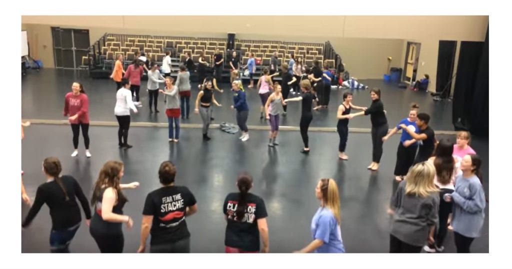 Group of dancers sit in a circle – tackle ‘impossible’ body percussion ...