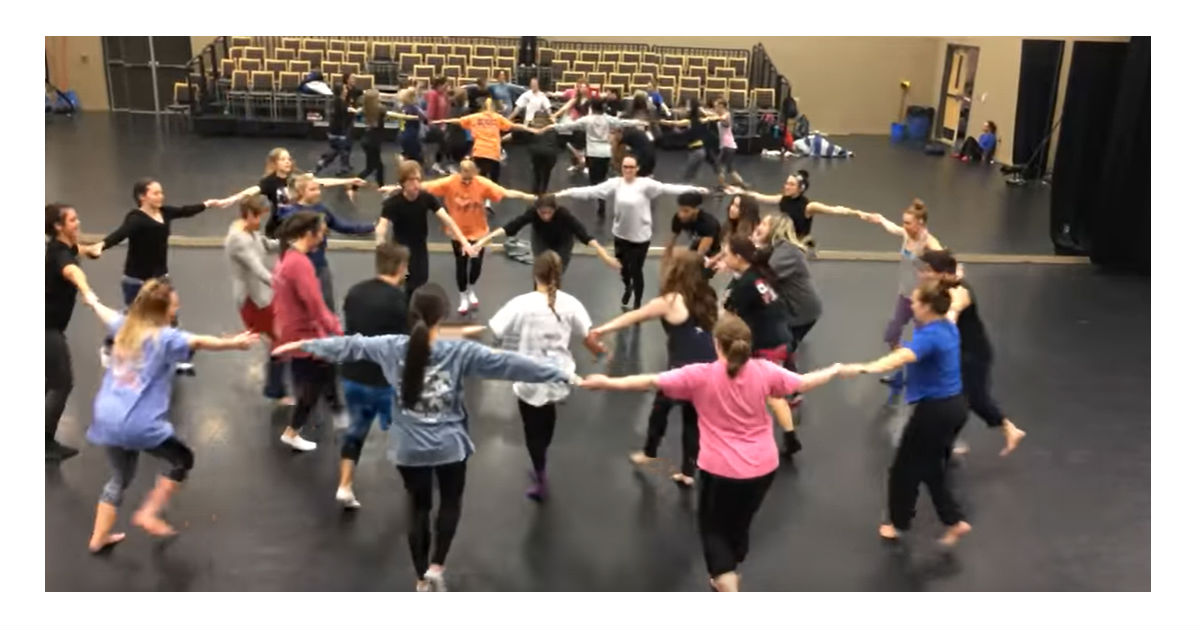 Group of dancers sit in a circle – tackle ‘impossible’ body percussion ...