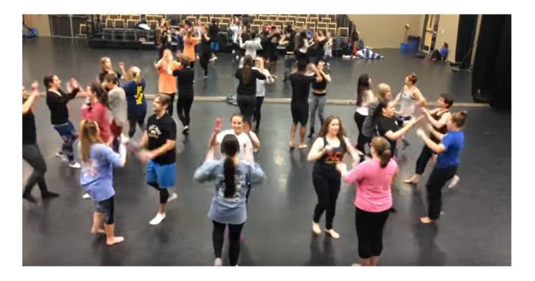 Group of dancers sit in a circle – tackle ‘impossible’ body percussion ...