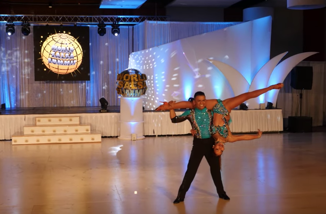 Salsa dancers begin with impossible pose – then light up the dance ...