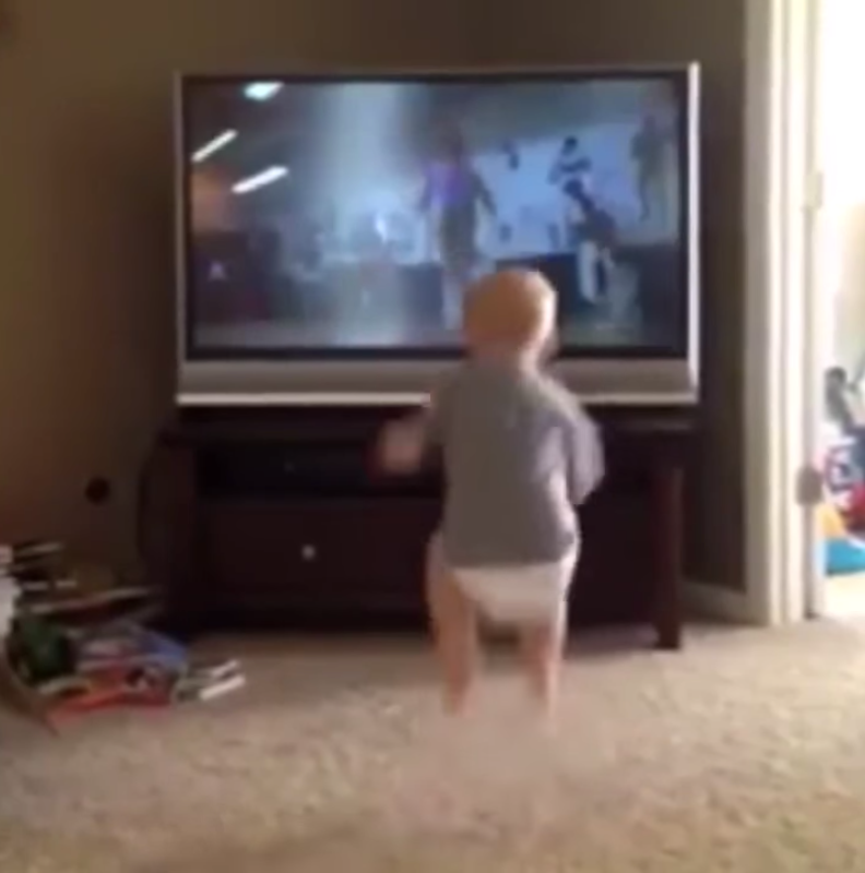 Funny toddler mimics Rocky workout montage while watching his favorite ...