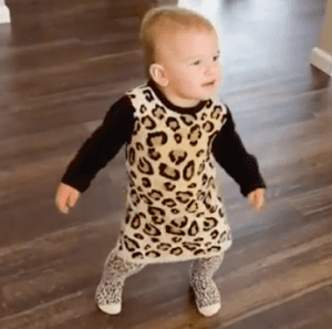 Baby girl starts twisting and shaking every time mom plays music