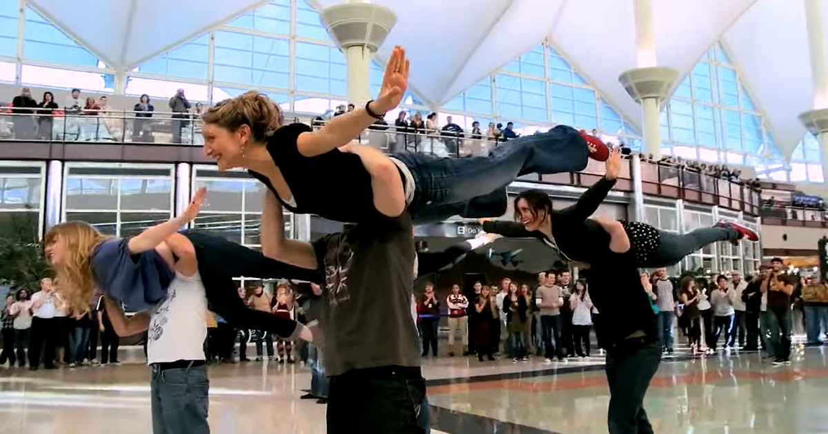 Swing dancing flash mob takes over Denver airport in seconds of music ...