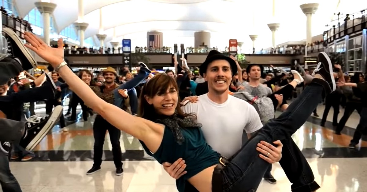 Swing dancing flash mob takes over Denver airport in seconds of music ...