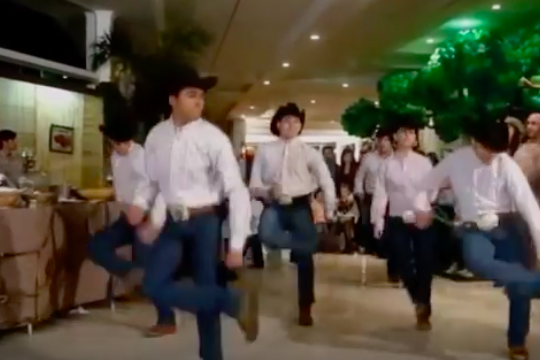 Dancing cowboys take over dance floor with high-flying routine