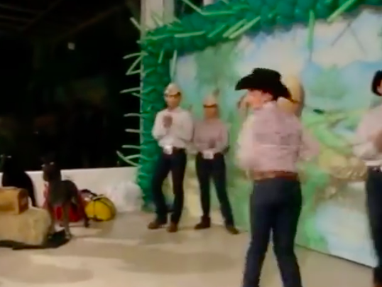 Dancing cowboys take over dance floor with high-flying routine