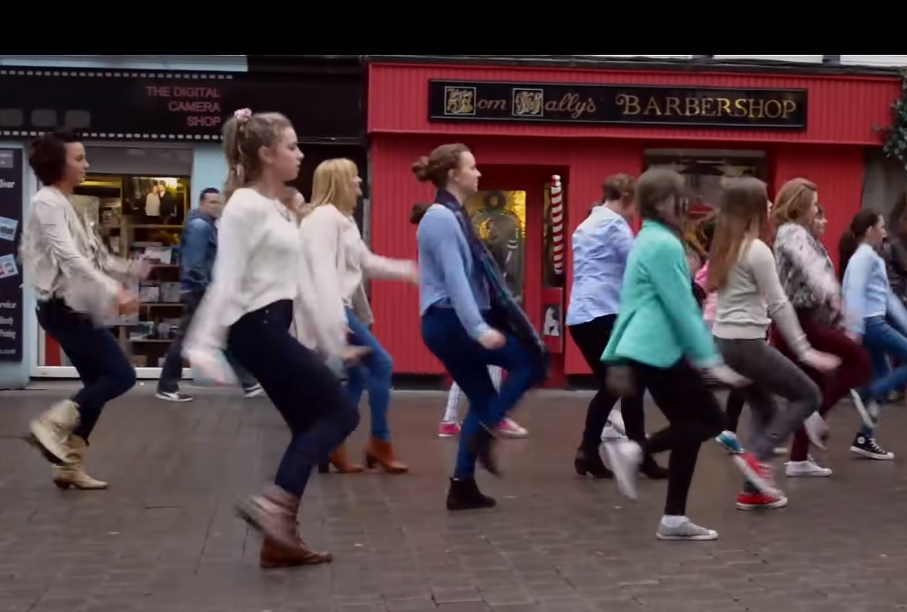 Woman Struts Out On Street Starting Dancing Flash Mob