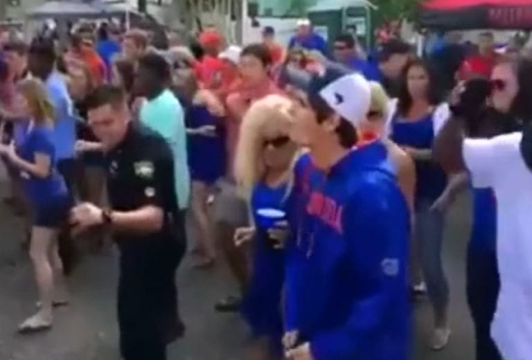 Cop can’t resist dancing along with the crowd when the Cupid Shuffle ...