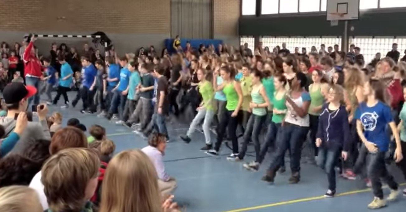 150 students take over gymnasium with incredibly impressive fast-paced ...