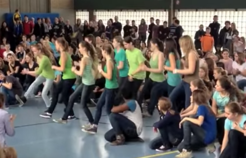 150 students take over gymnasium with incredibly impressive fast-paced ...
