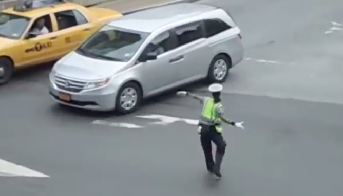 Cop directs traffic with such smooth moves it looks like she’s dancing