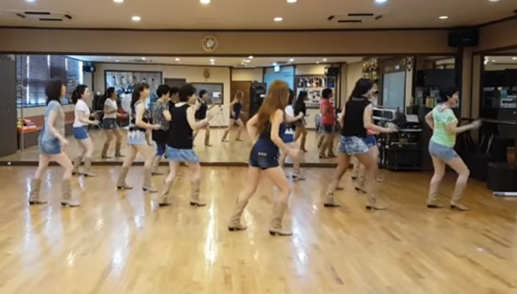 Line dancers break out slickest country moves to ‘Lonely Drum’