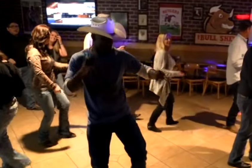 Handsome cowboy glides into party and steals the show with smooth line ...