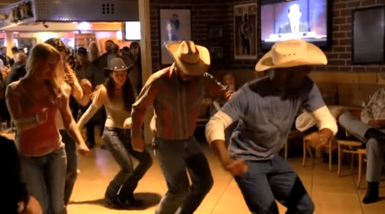 Handsome cowboy glides into party and steals the show with smooth line ...