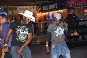 Handsome cowboy glides into party and steals the show with smooth line ...