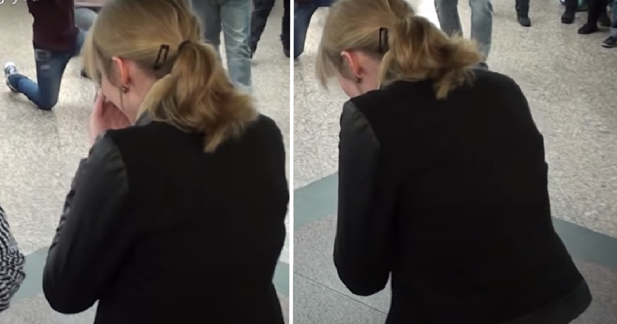 Woman in tears during flash mob when boyfriend emerges from dancers