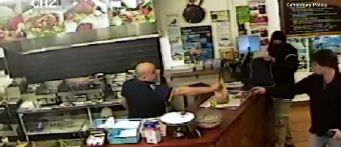 Armed robber walks out of shop annoyed when no one greets him