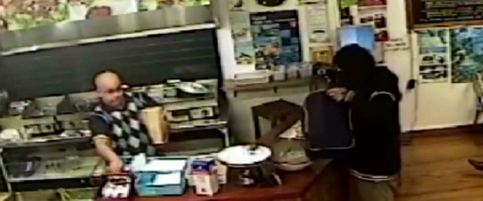 Armed robber walks out of shop annoyed when no one greets him