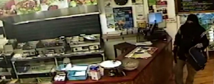 Armed robber walks out of shop annoyed when no one greets him