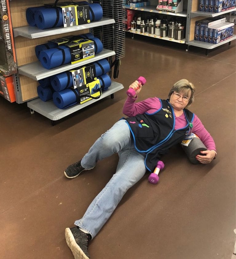 50 hilarious pics of a Walmart lady going above & beyond to sell products
