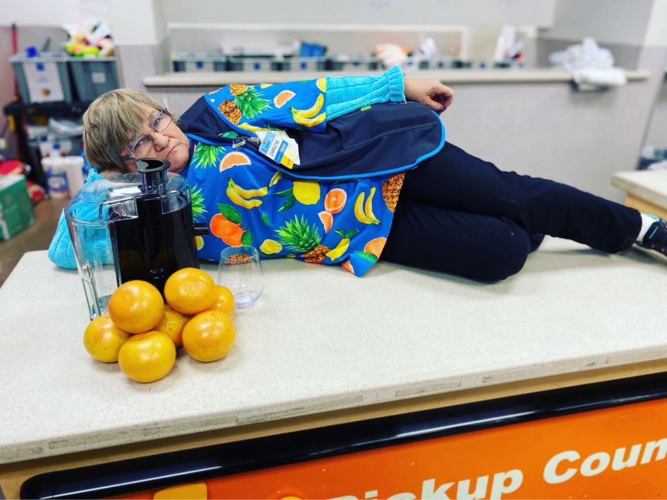 50 hilarious pics of a Walmart lady going above & beyond to sell products