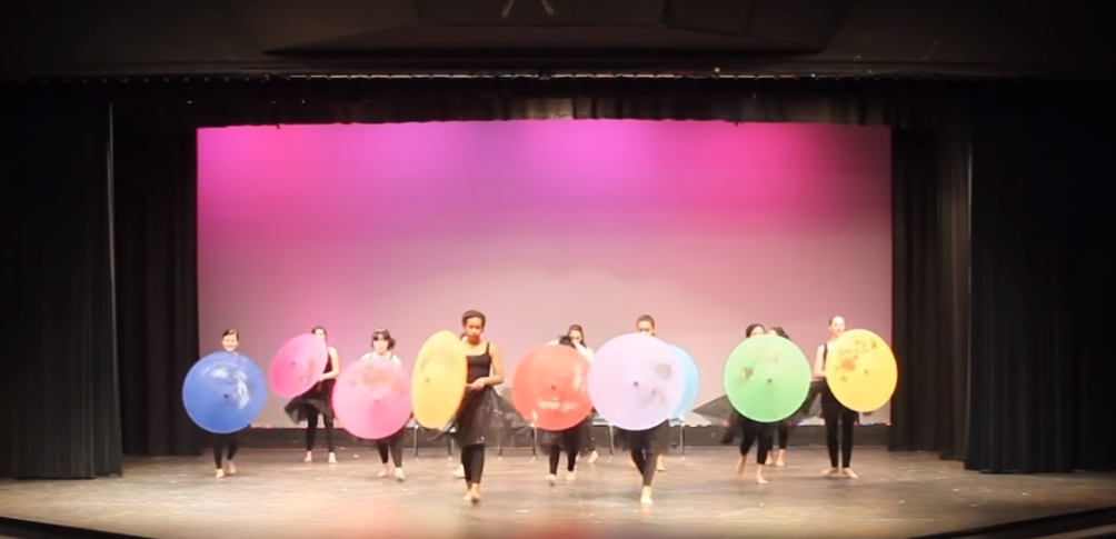 High school girls perform mesmerizing umbrella dance that will go down ...