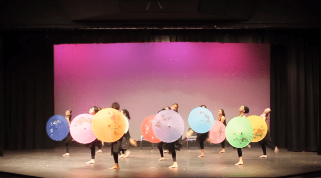 High school girls perform mesmerizing umbrella dance that will go down ...