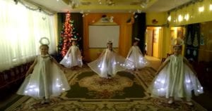 5 Little angels with wings perform celestial routine