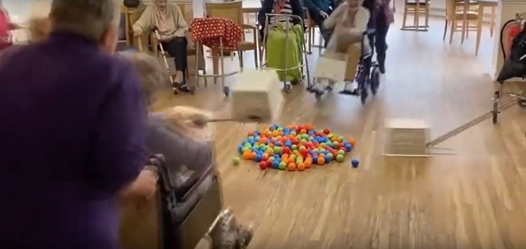 Seniors enjoy a life-size ‘Hungry Hungry Hippos’ game during quarantine